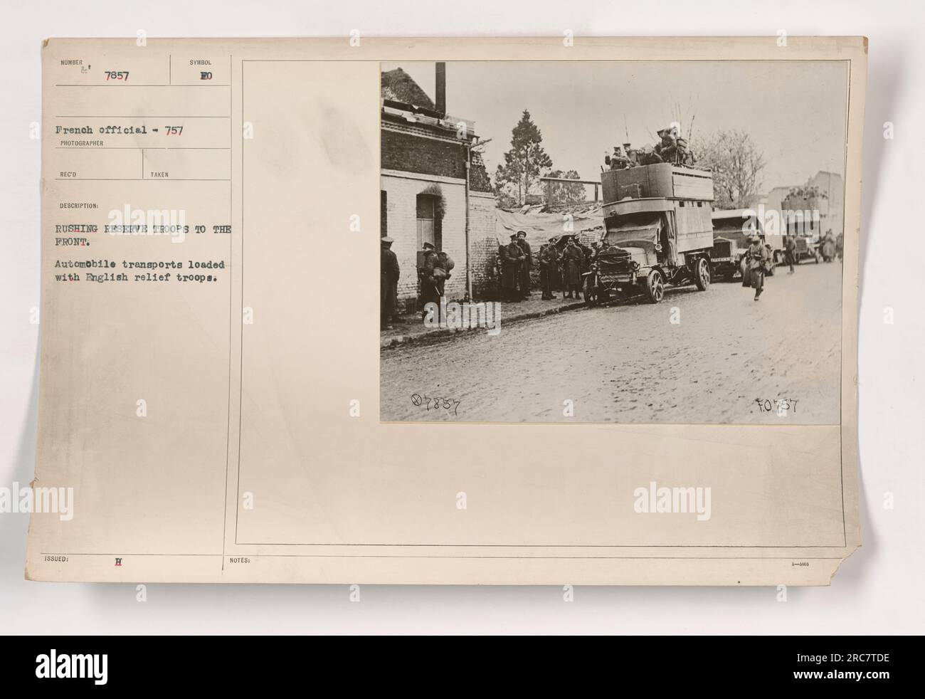 Automobile transports carrying English reserve troops rush to the front ...