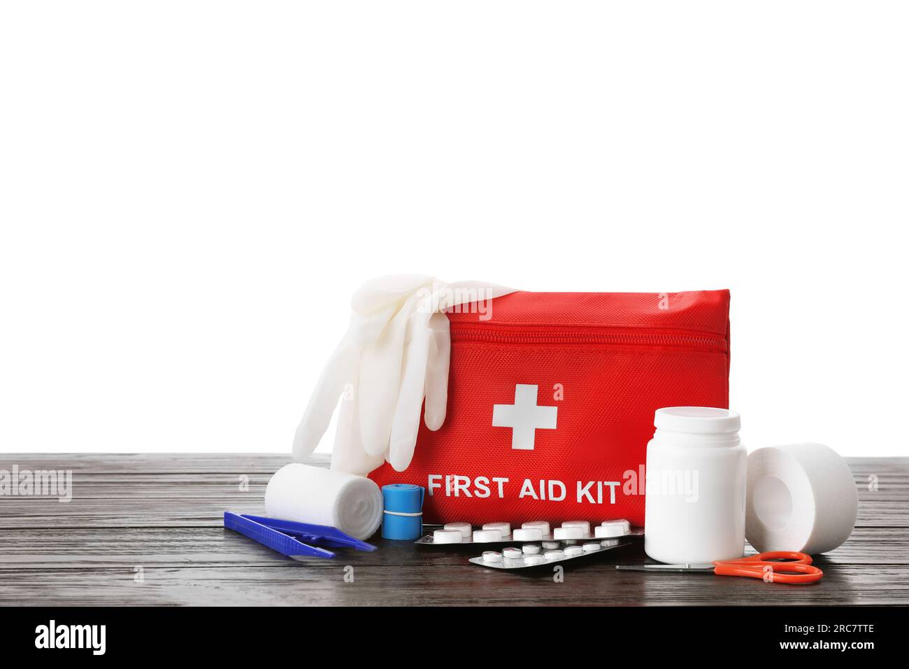 First aid kit, scissors, gloves, pills, plastic forceps and elastic ...