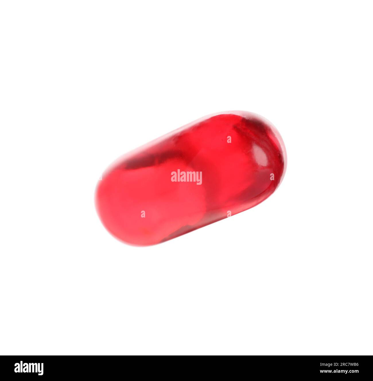 One red pill isolated on white. Medicinal treatment Stock Photo - Alamy