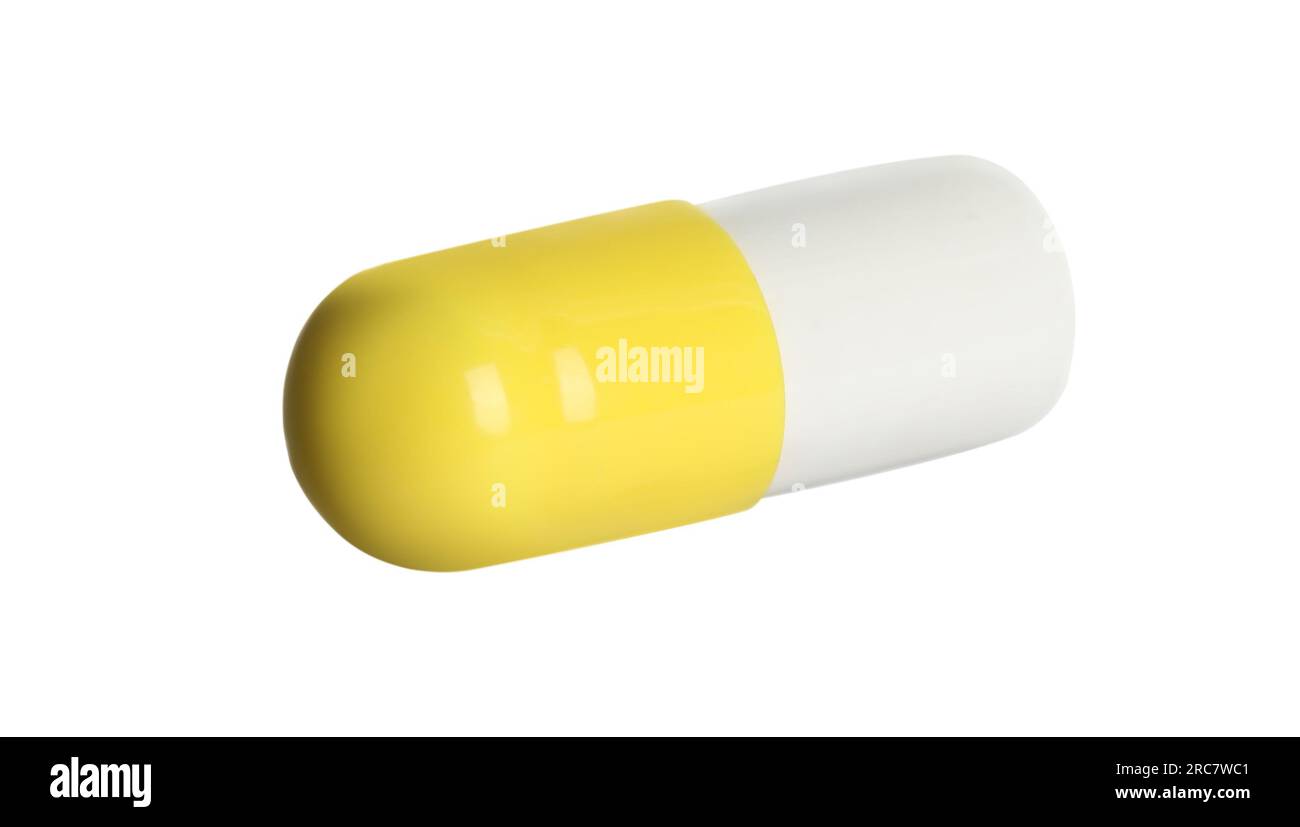 One pill isolated on white. Medicinal treatment Stock Photo - Alamy