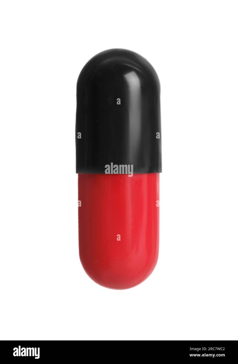 One pill isolated on white. Medicinal treatment Stock Photo - Alamy