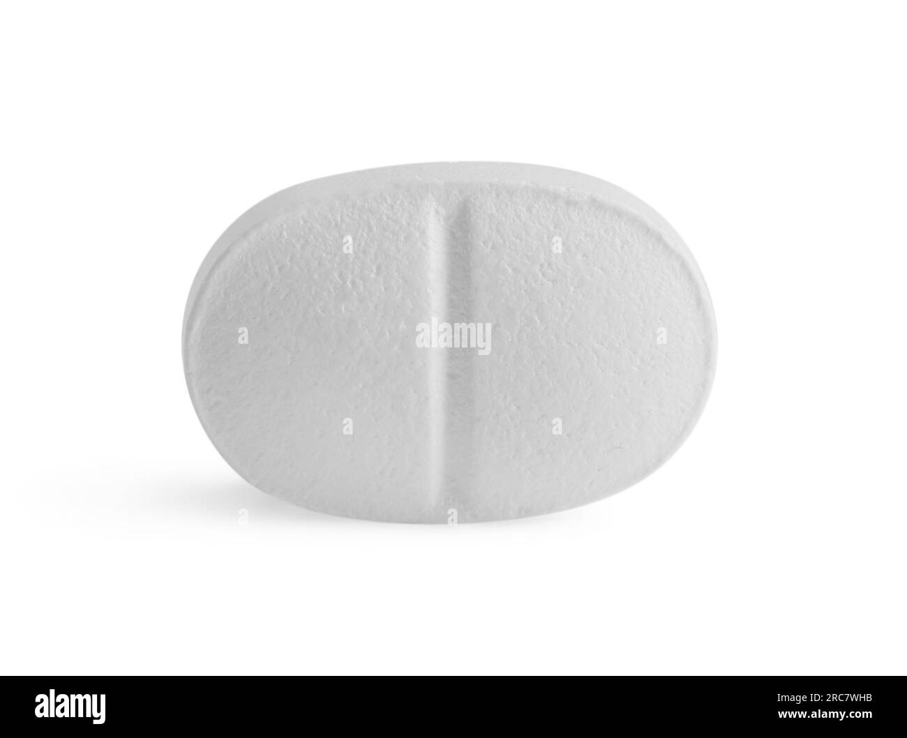 One pill on white background. Medicinal treatment Stock Photo - Alamy