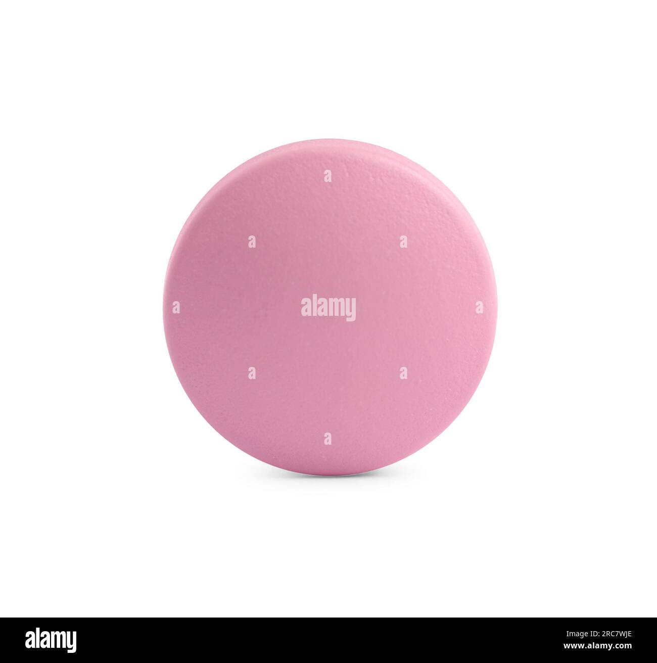 One pink pill on white background. Medicinal treatment Stock Photo - Alamy