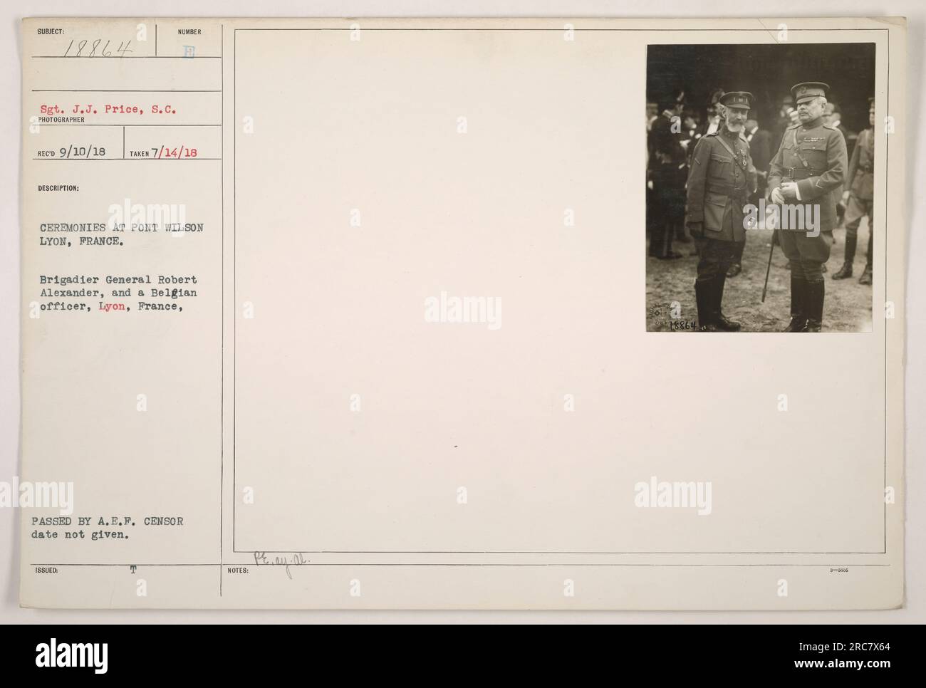 Brigadier General Robert Alexander, alongside a Belgian officer, attend ...