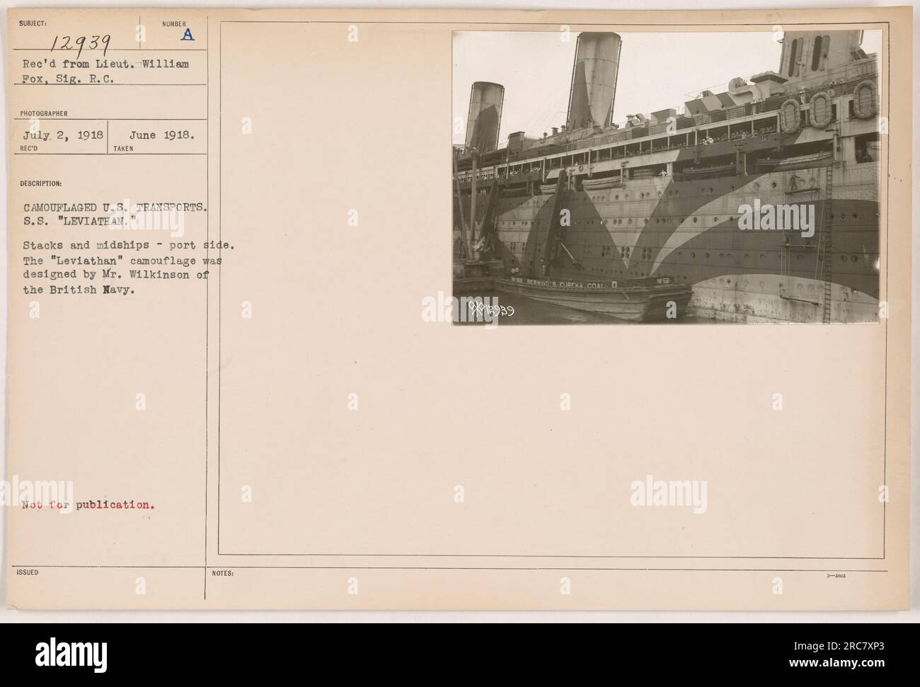 A camouflaged U.S. transport ship, the S.S. "Leviathan," is seen in ...