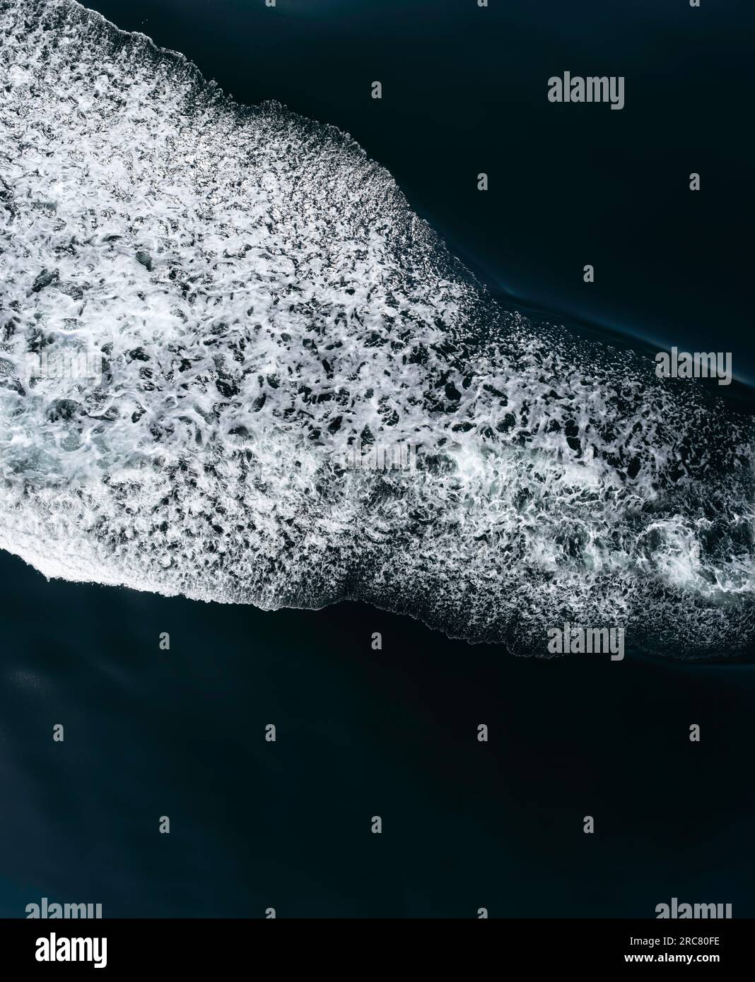 Water splashing out from the center on both sides. Space for text and ...