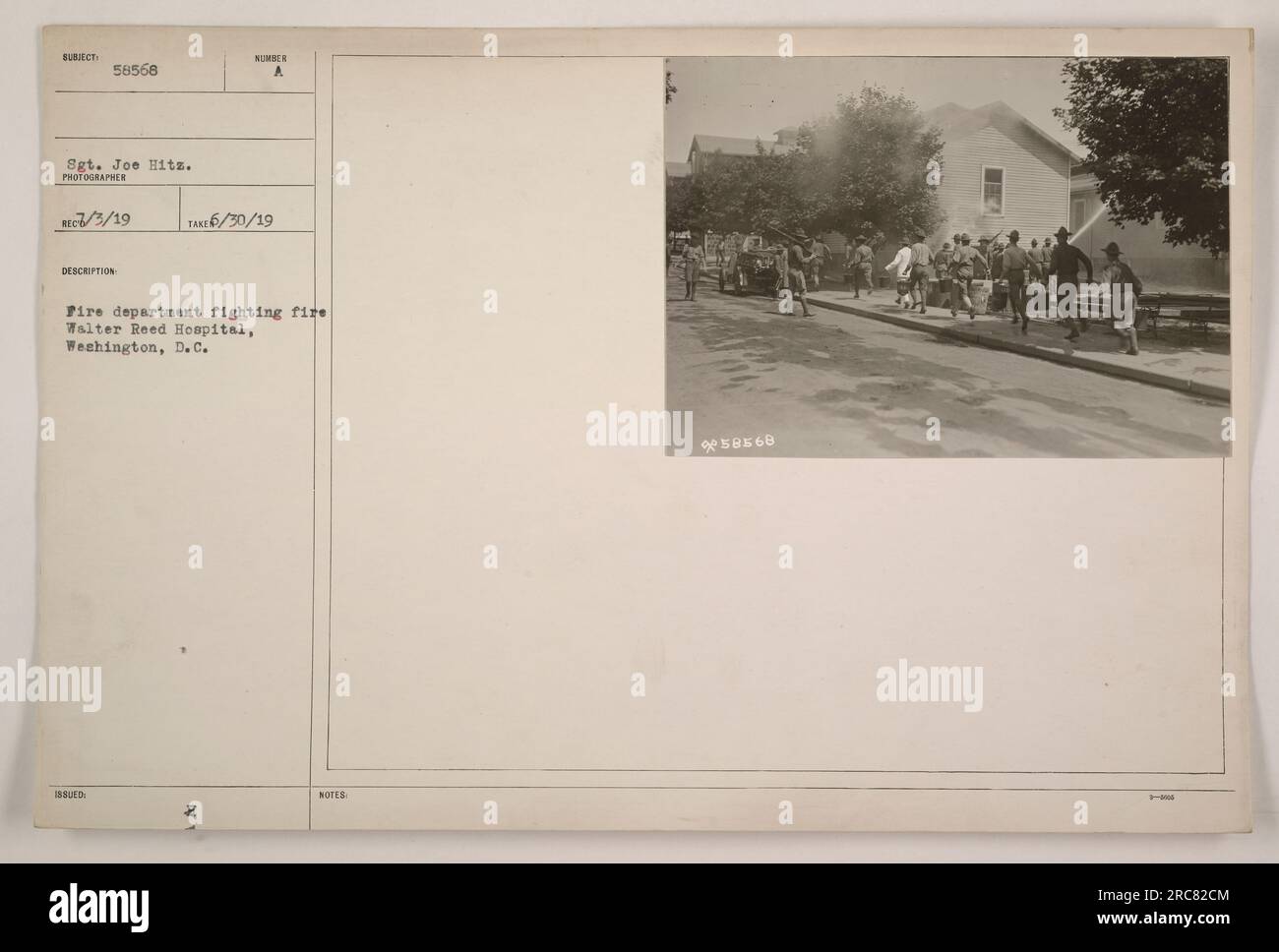 Firefighters from the Fire Department are seen responding to a fire at ...