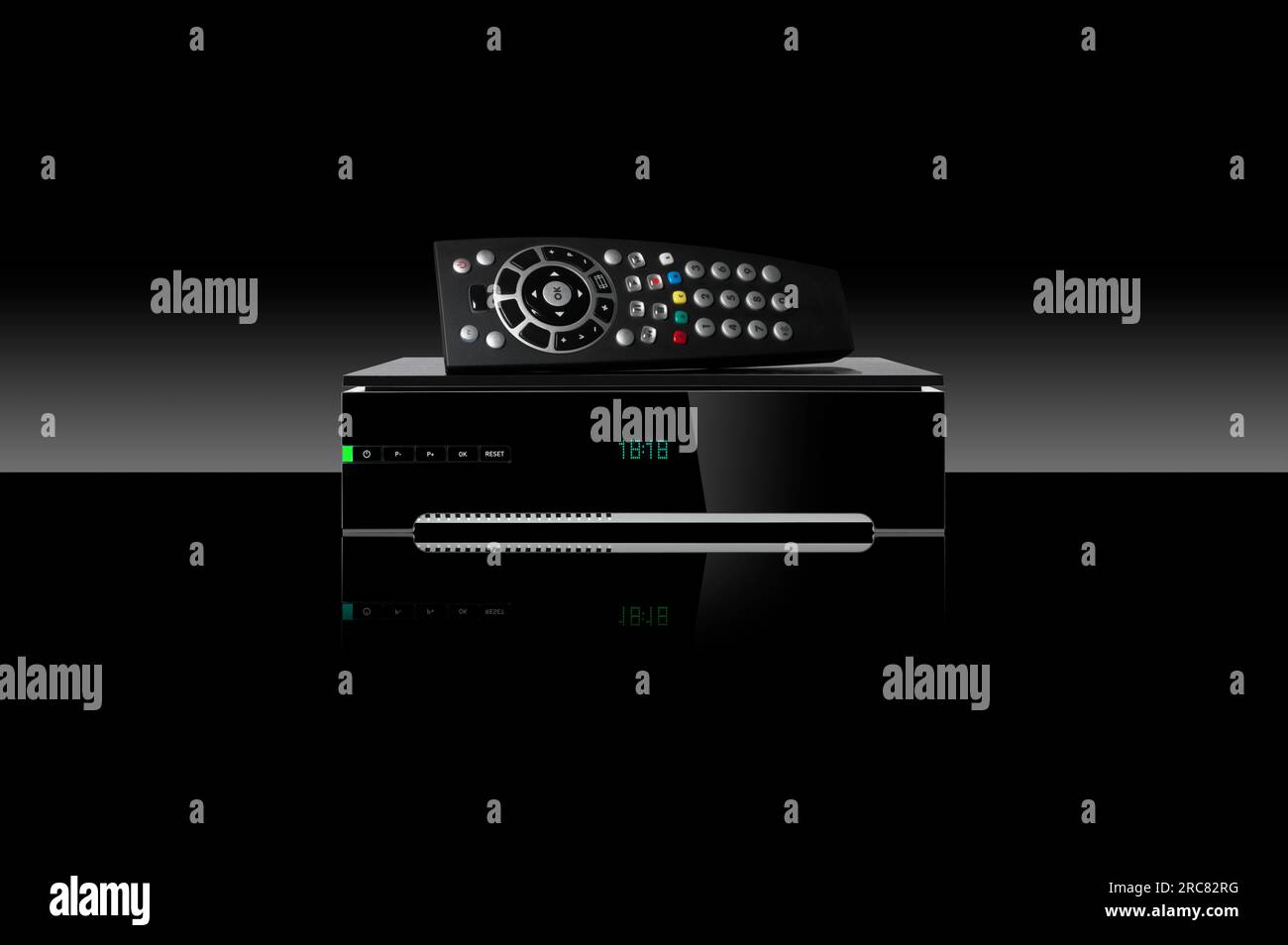 Tv decoder and remote control set isolated on white background Stock ...