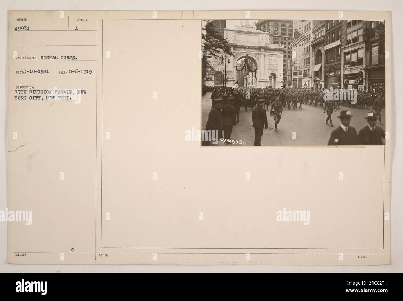 77th Division soldiers marching in a parade through New York City ...