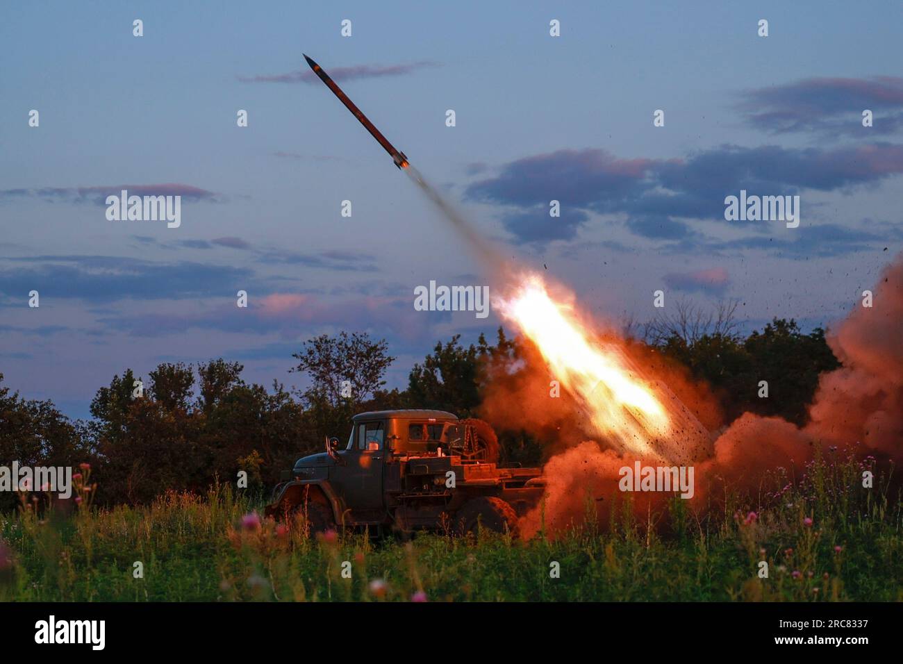 A Ukrainian army Grad multiple rocket launcher fires rockets at Russian ...