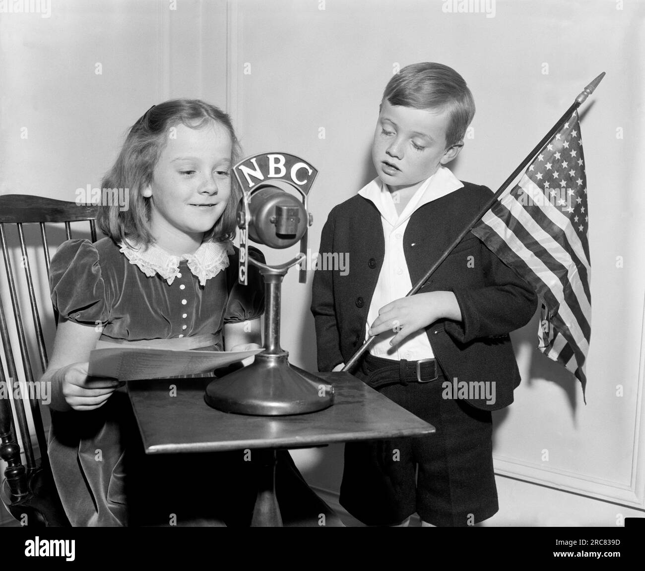 United States: c. 1938 Two children with an American flag and a script ...