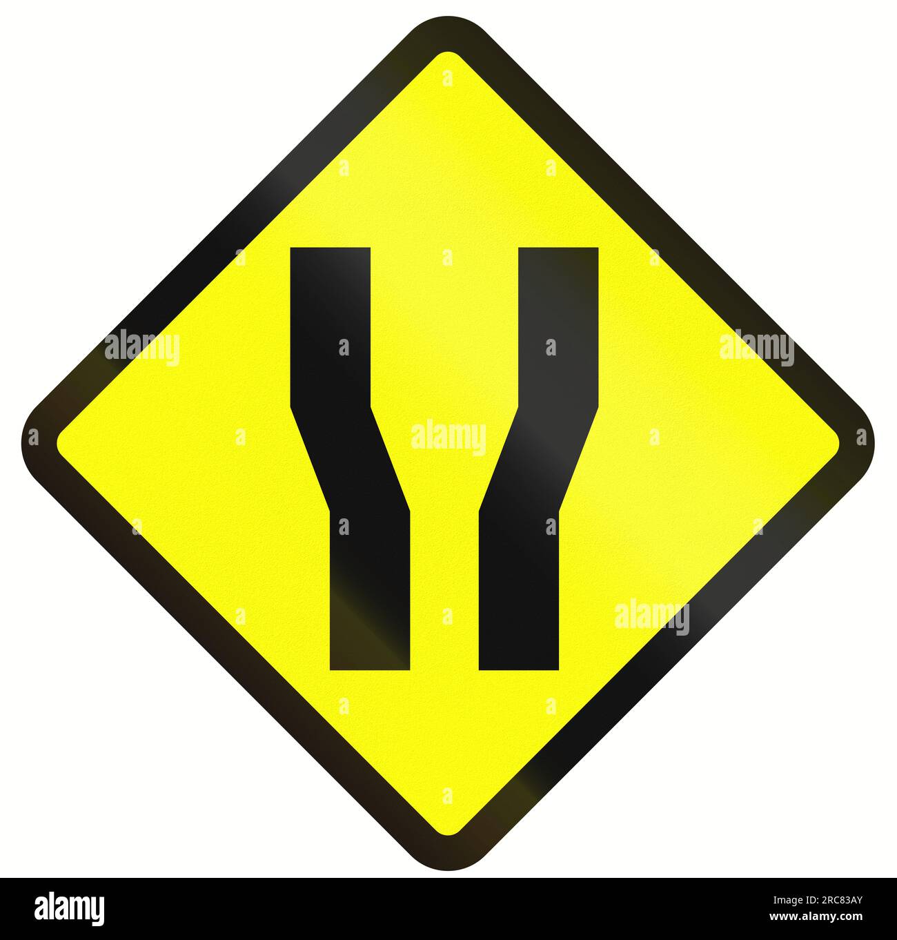 Indonesian road warning sign: Road widens on both sides Stock Photo - Alamy