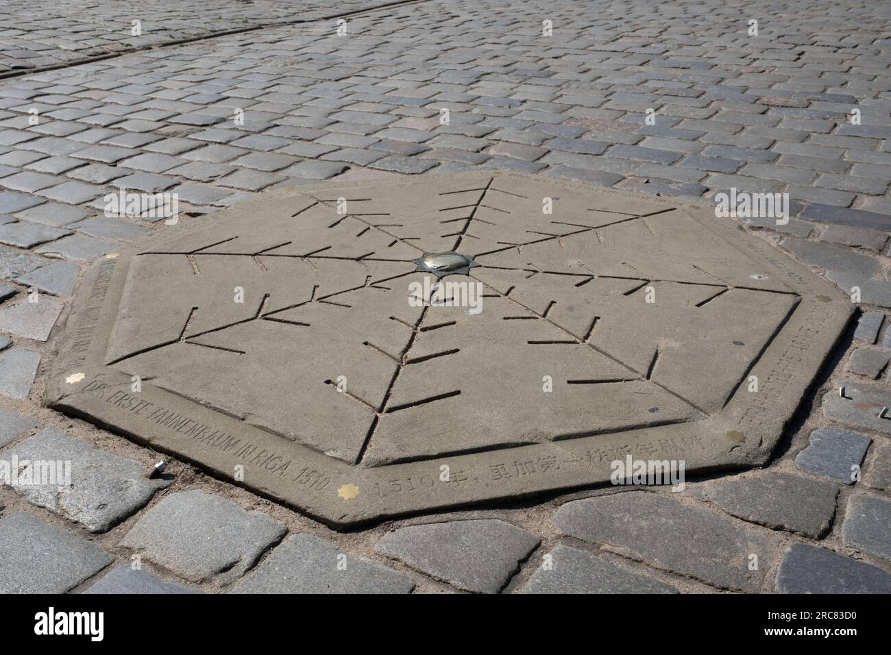 Stone on the Town Hall square in the city of Riga in Latvia marks the ...