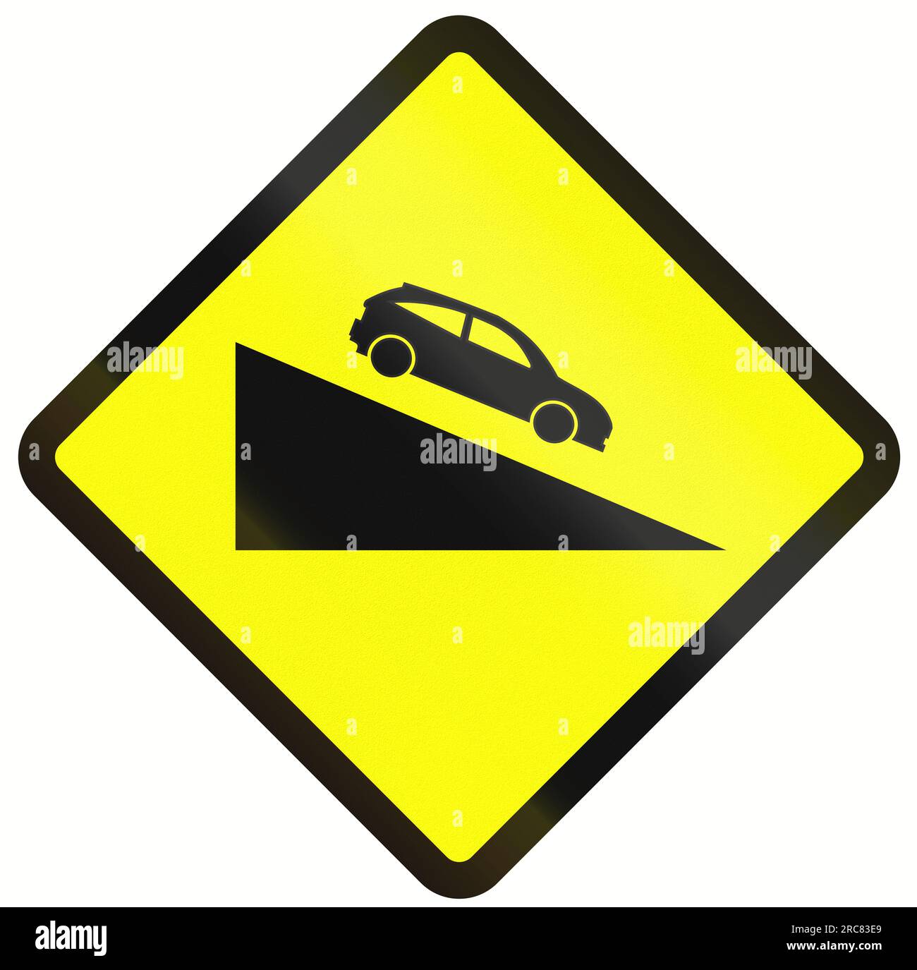 Indonesian road warning sign - Downhill grade Stock Photo - Alamy