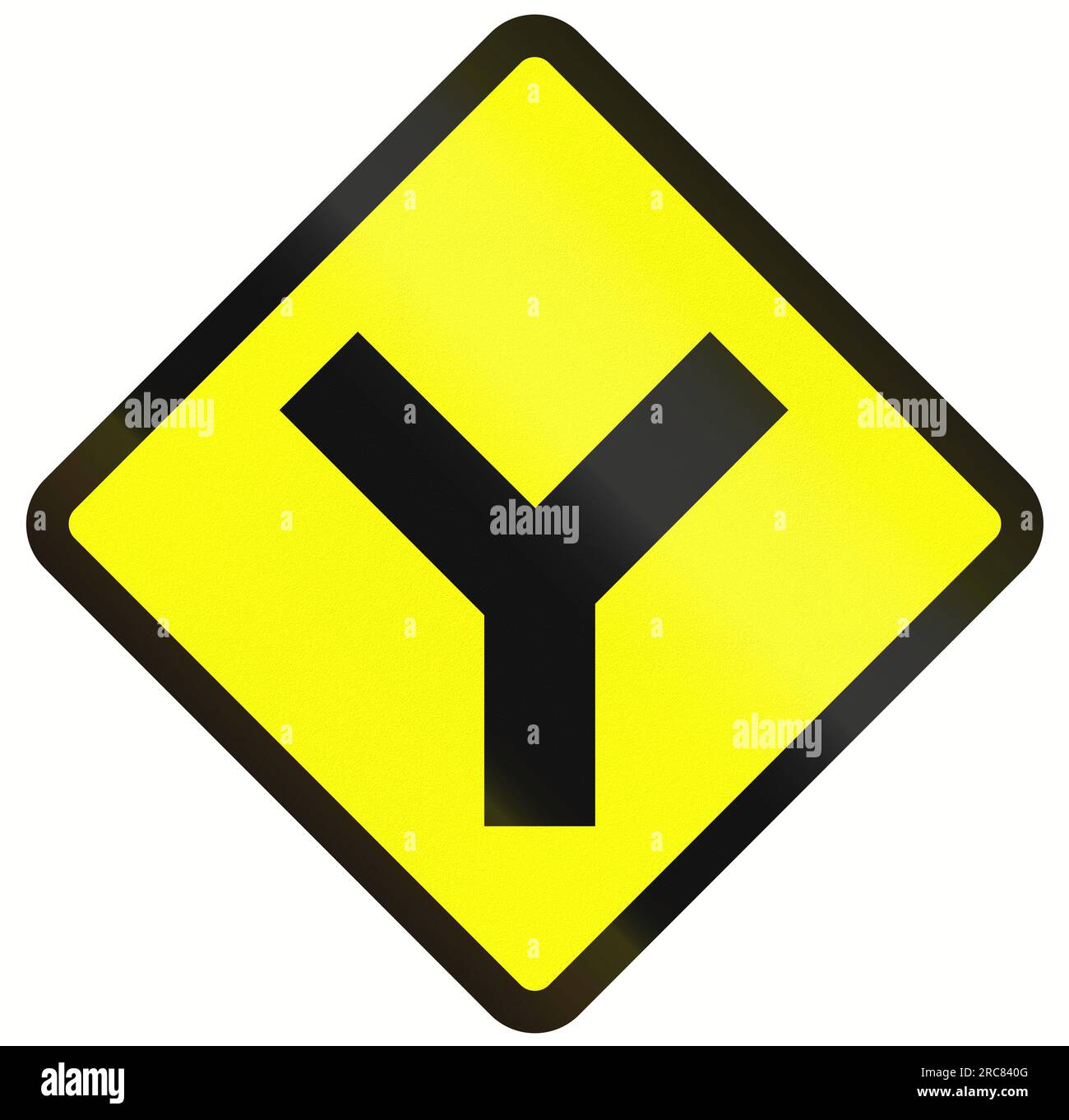 Indonesian road warning sign - Y-Intersection ahead Stock Photo - Alamy