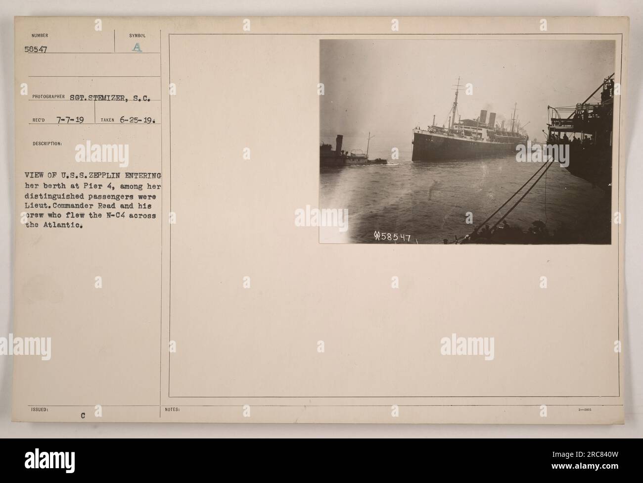 U.S.S. Zeppelin docking at Pier 4, carrying Lieutenant Commander Read ...