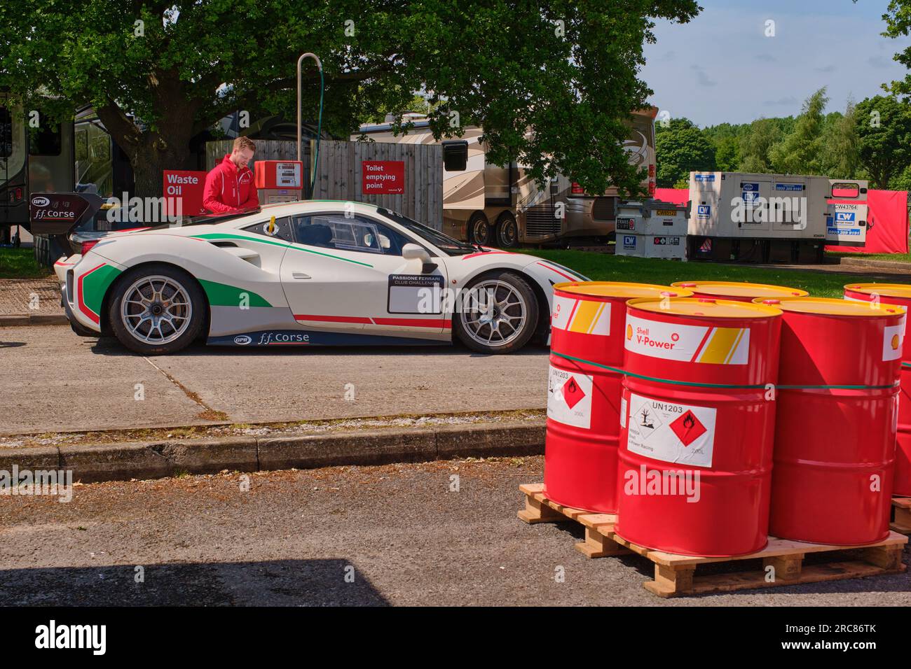 A Ferrari Challenge racing car fuels up at the pump at Oulton Park ...