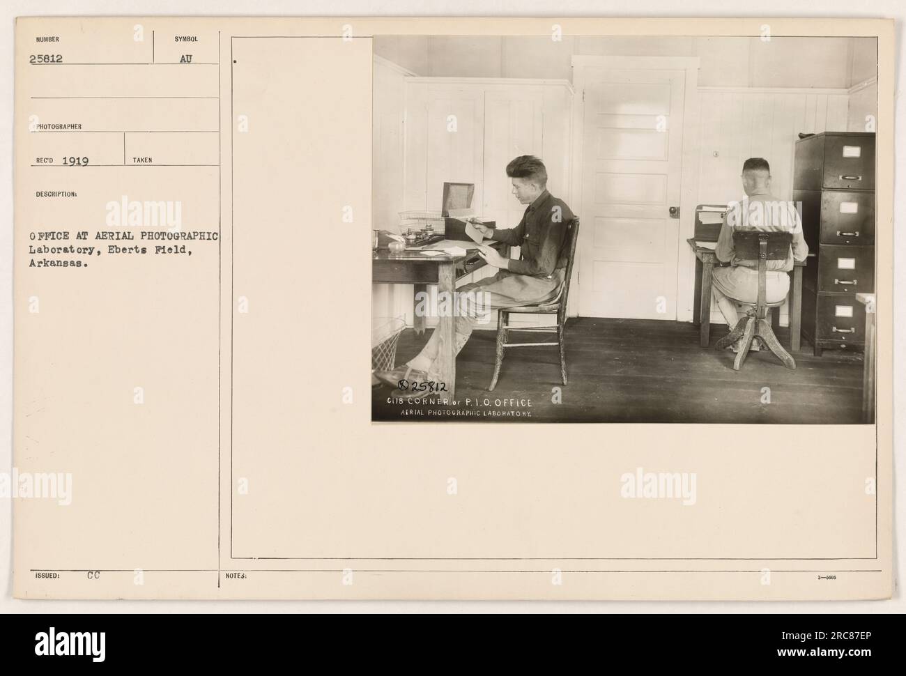 This photograph depicts the office at the Aerial Photographic ...