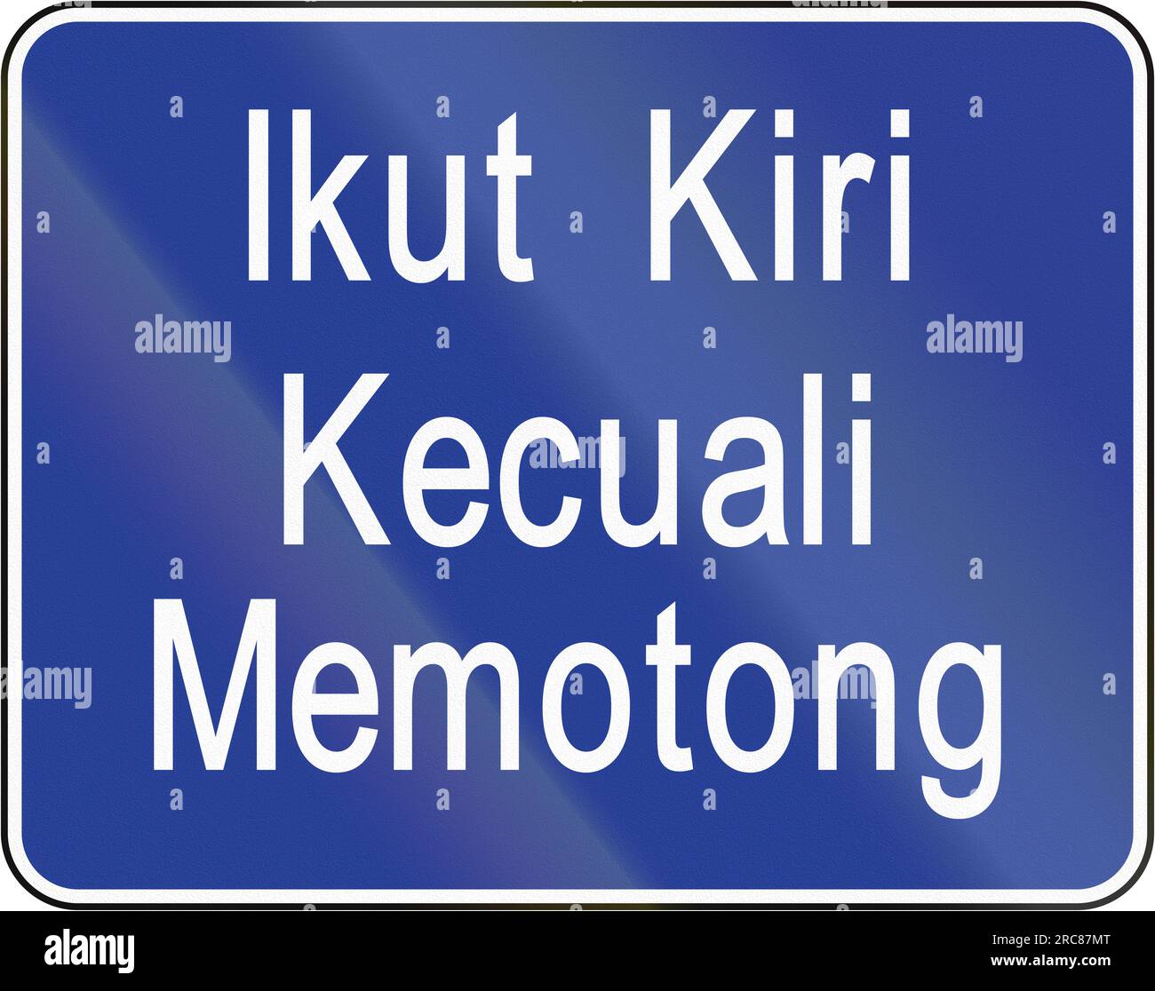 Road sign in Brunei: Ikut kiri kecuali memotong/Keep left unless ...