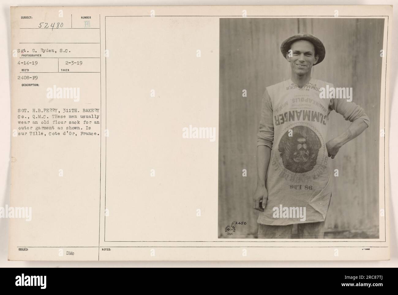 Sgt. H.B. Perry of the 311th Bakery Co., Q.M.C, is seen wearing an old ...