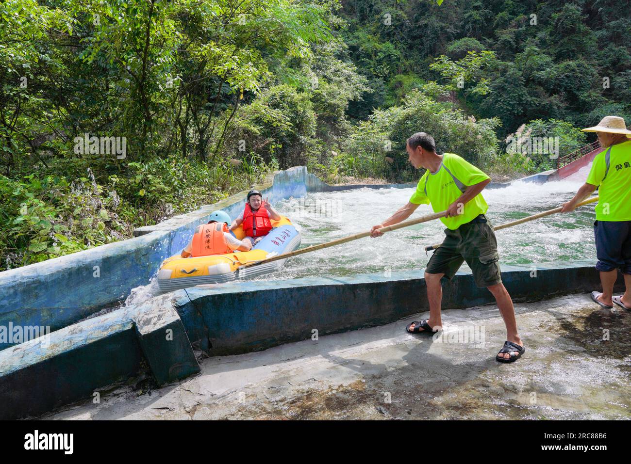 Tourists experience rafting at Shunhuangshan National Forest Park in ...