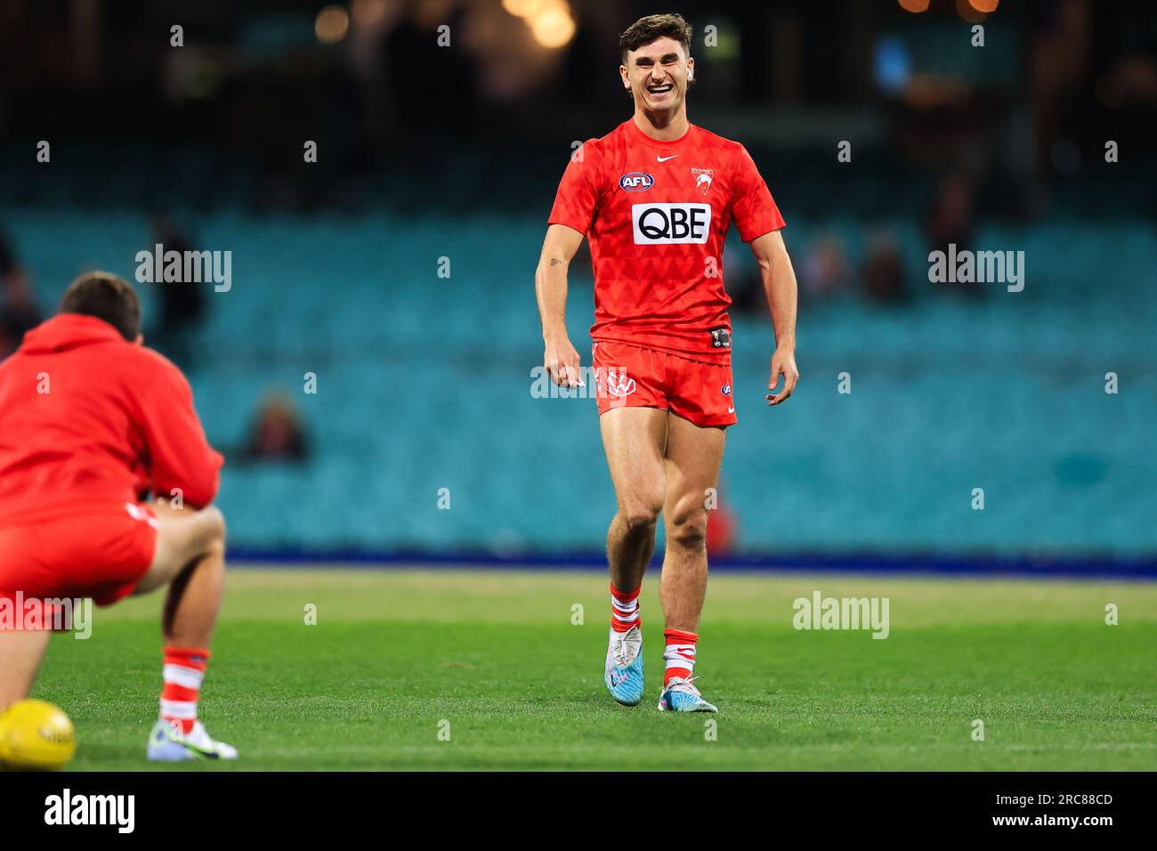 Sam Wicks of the Swans has a laugh during the warm up ahead of the AFL ...