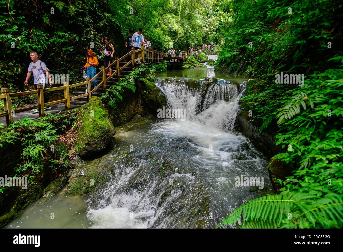 People escape the summer heat at the Black Valley scenic area in ...