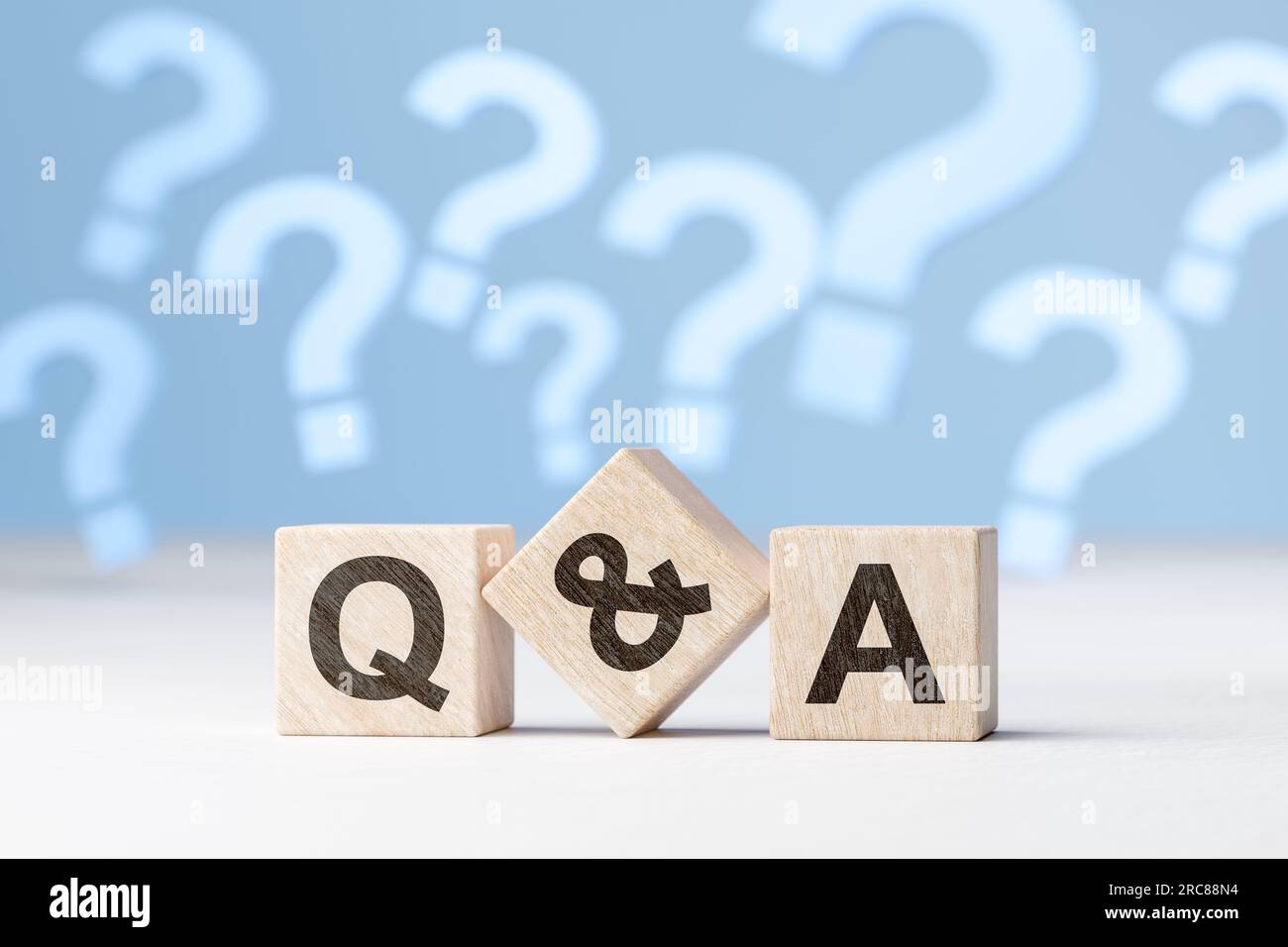 Question and Answers on cubes. question mark symbol on blue background ...