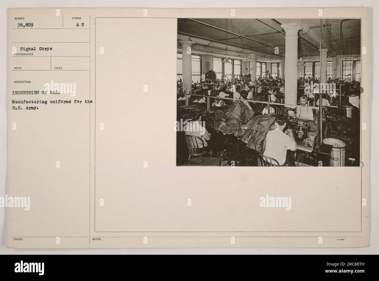 Workers at the AU Industries of War factory manufacturing uniforms for ...