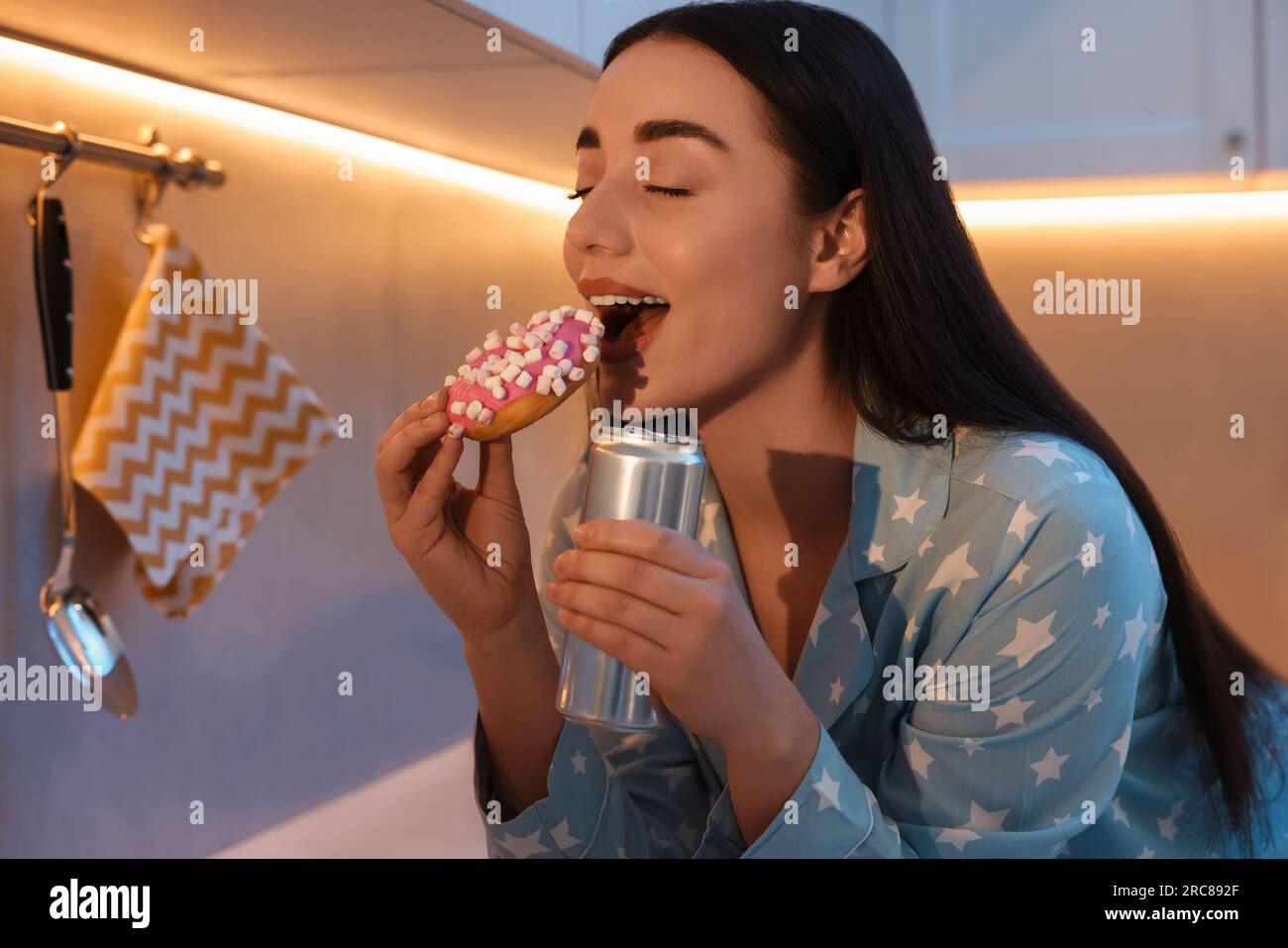 Late night snack young woman hi-res stock photography and images - Alamy