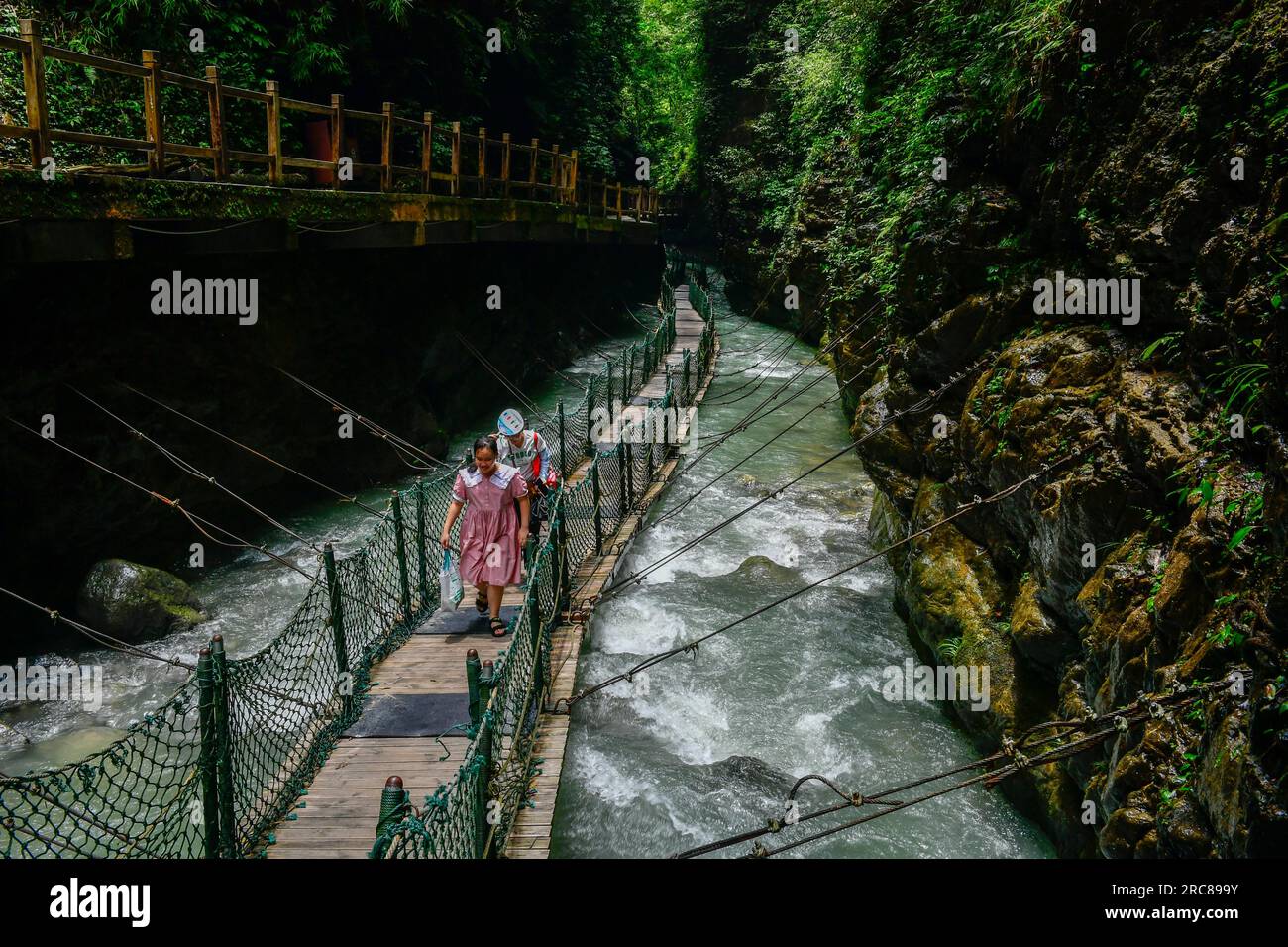 People escape the summer heat at the Black Valley scenic area in ...