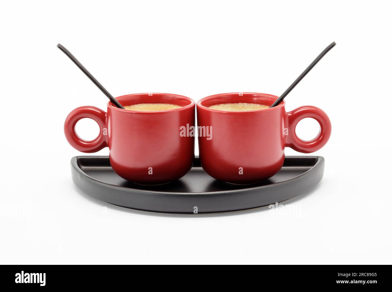 Two red cups filled with strong Americano cut out Stock Photo - Alamy