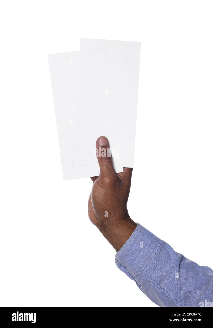 African American man holding flyers on white background, closeup ...