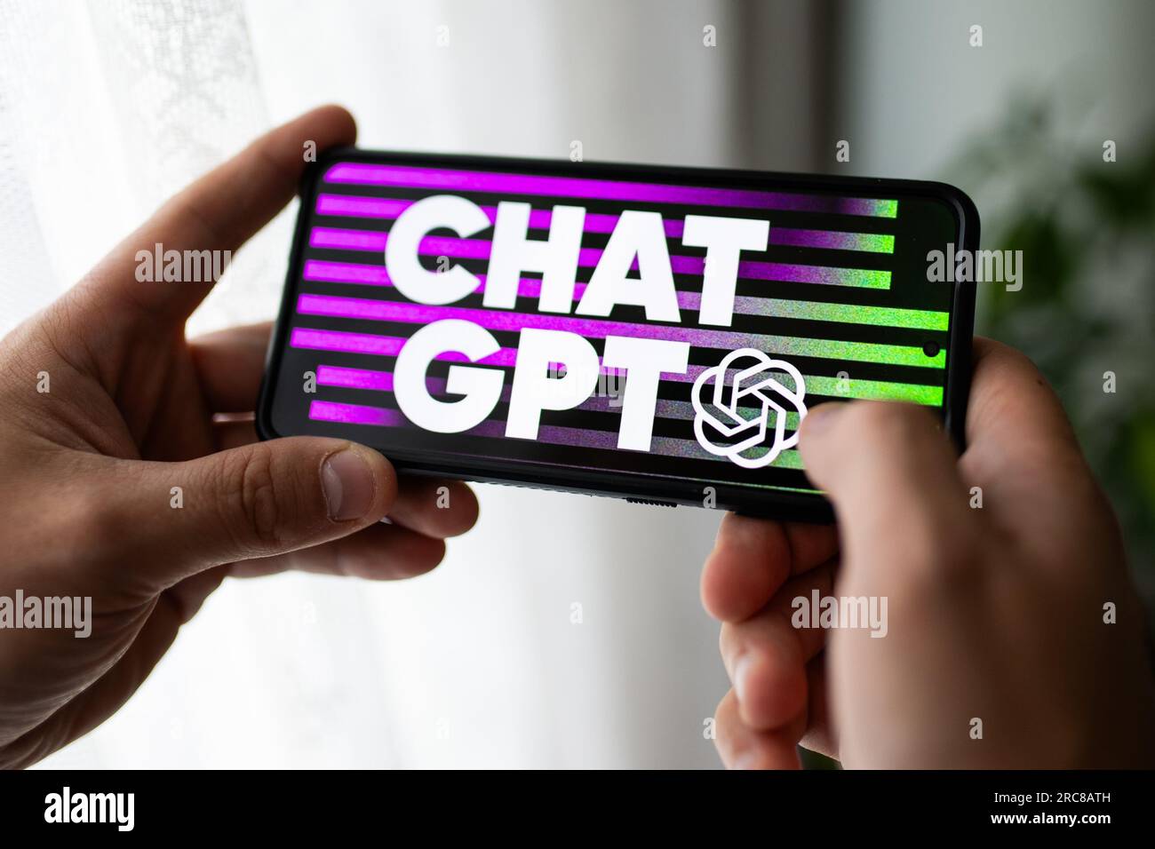 In this photo illustration a Chat GPT logo seen displayed on a ...