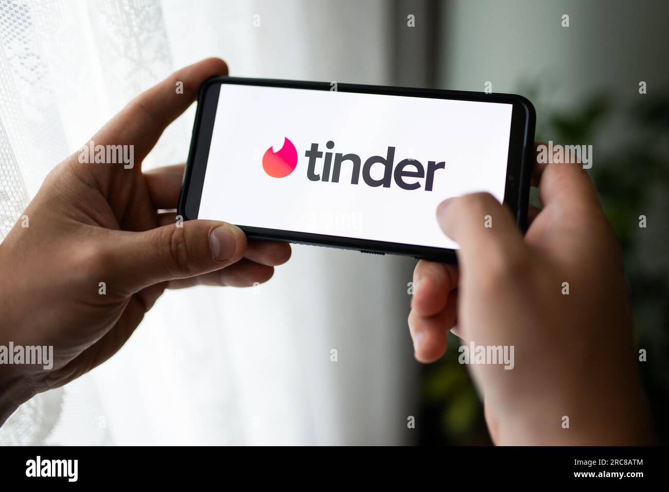 Photo illustration tinder logo hi-res stock photography and images - Alamy