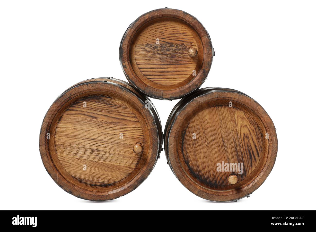 Three traditional wooden barrels on white background Stock Photo - Alamy
