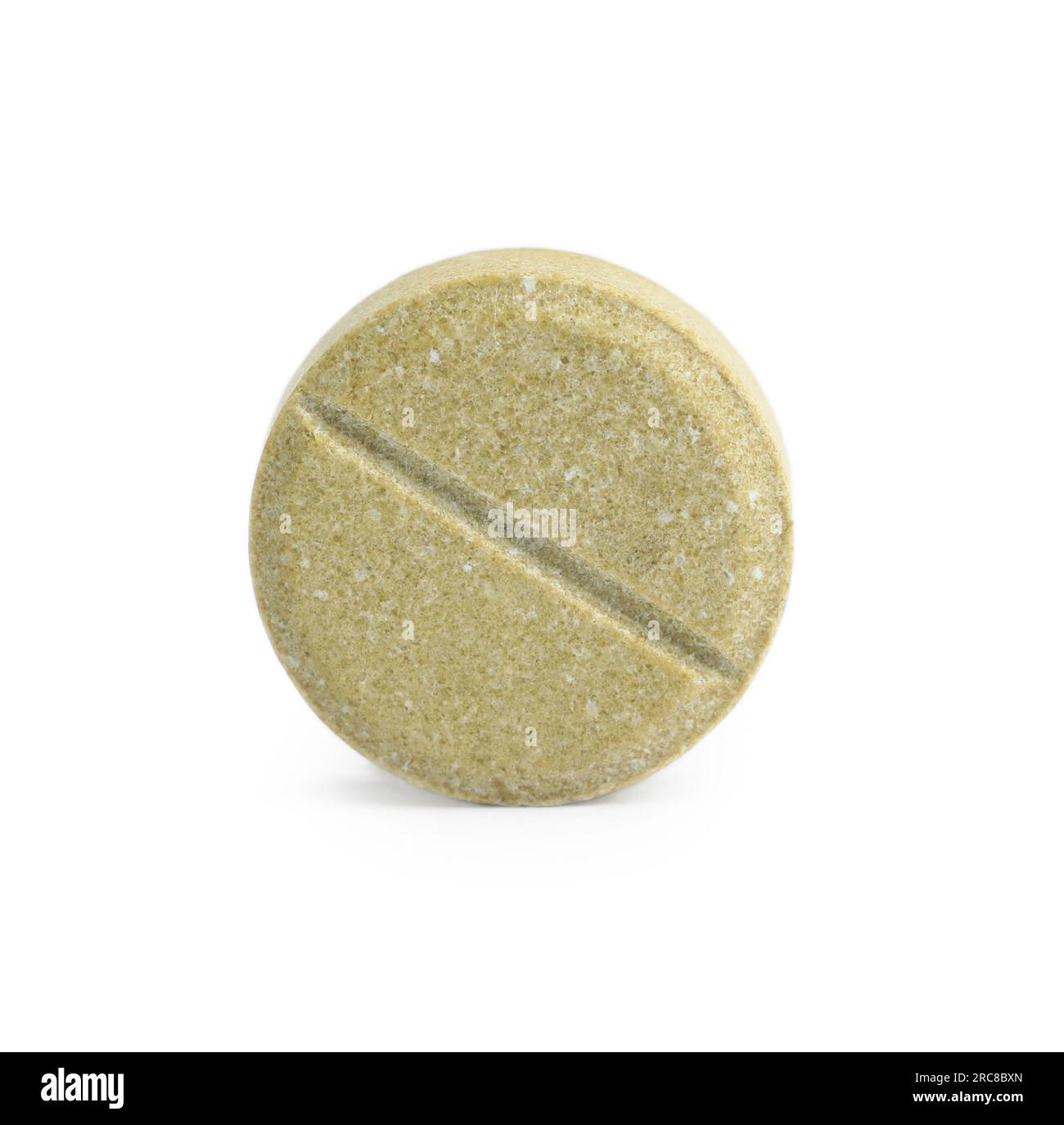 One round pill on white background. Medicinal treatment Stock Photo - Alamy