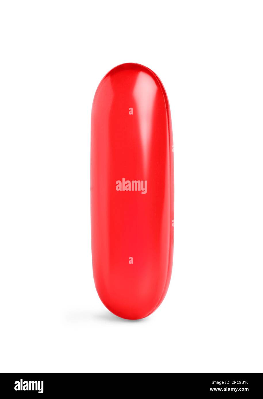 One red pill isolated on white. Medicinal treatment Stock Photo - Alamy