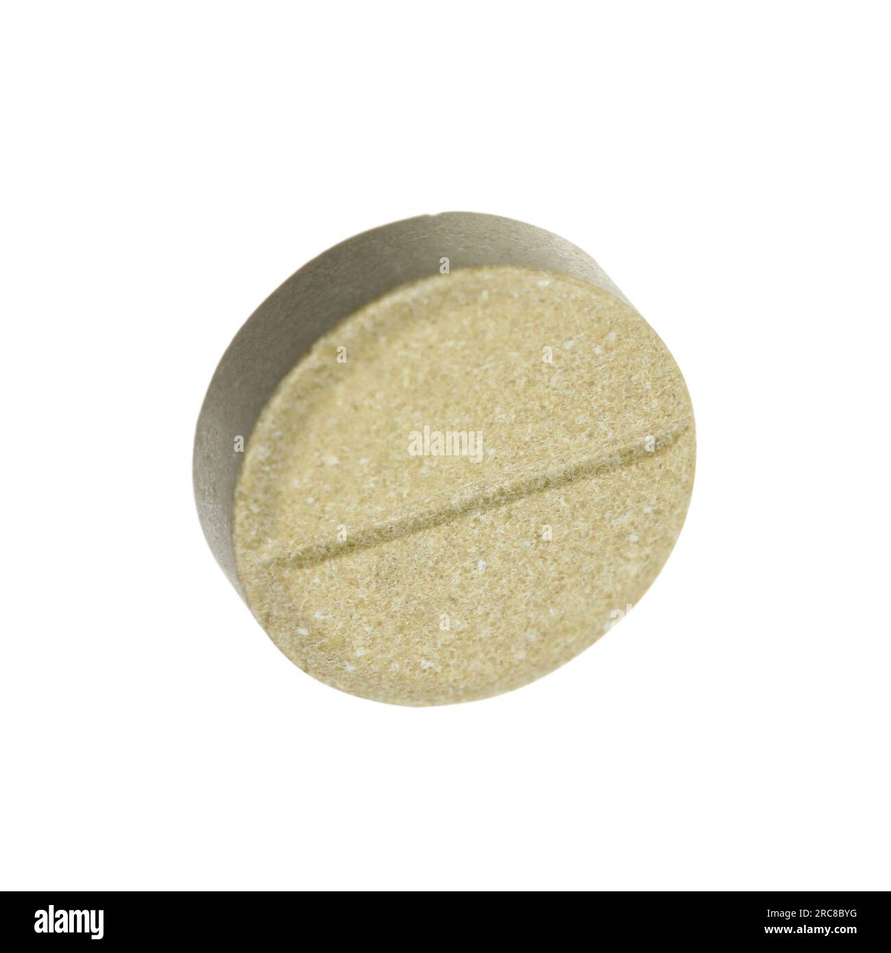 One round pill on white background. Medicinal treatment Stock Photo - Alamy