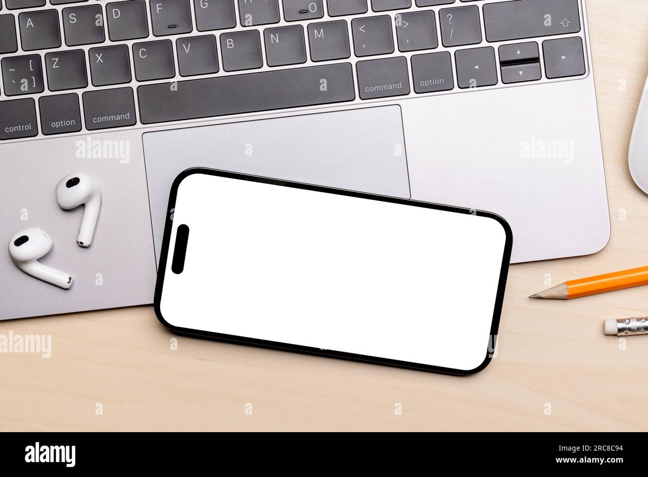 Blank white screen smartphone on a desk, perfect for your design mockup ...