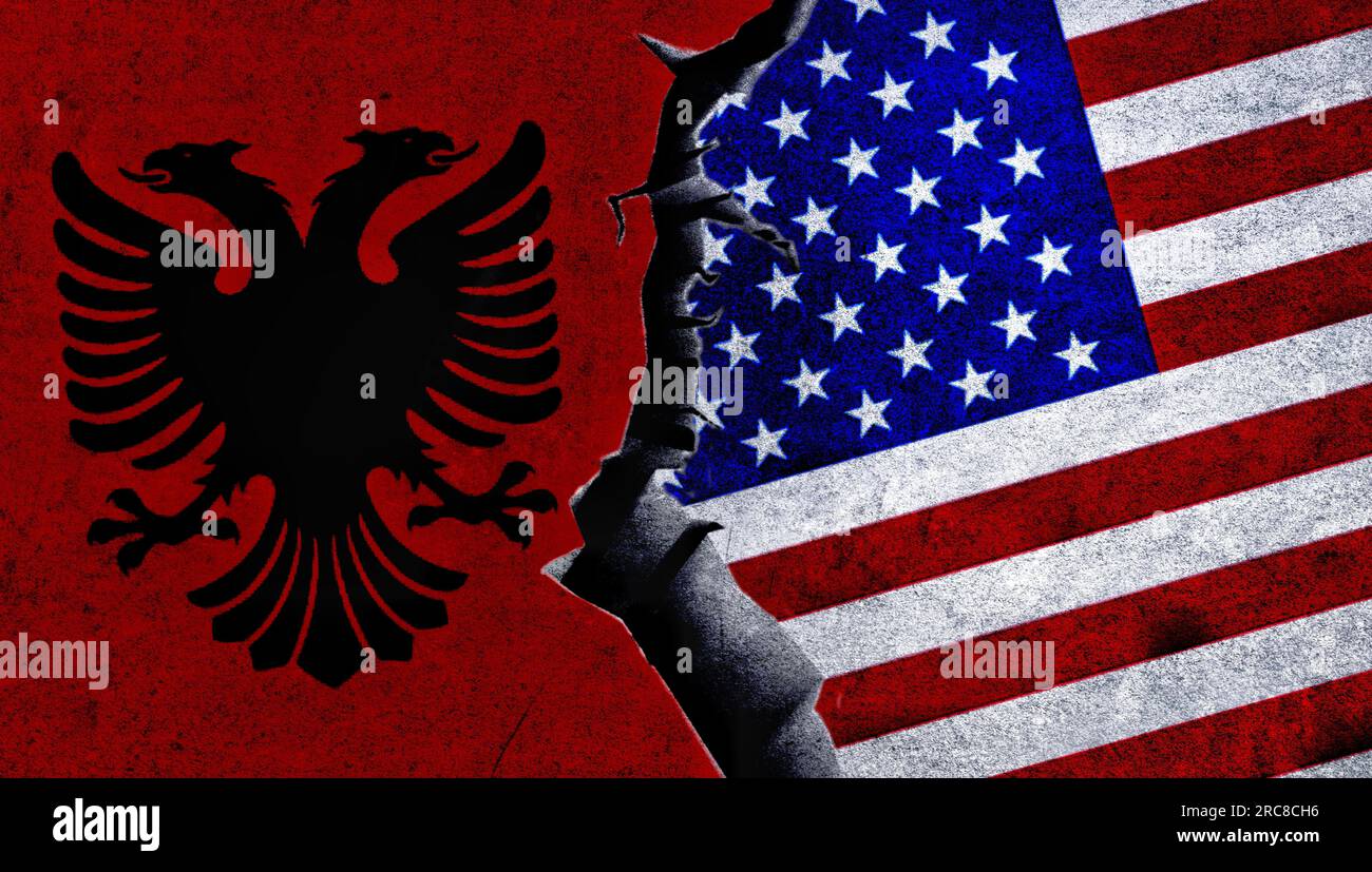 USA and Albania flag together on a textured wall. Relations between ...