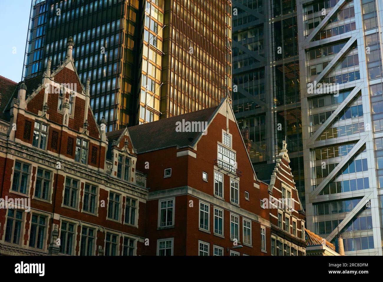 Old buildings with skyscrapers in the background in the City of London ...
