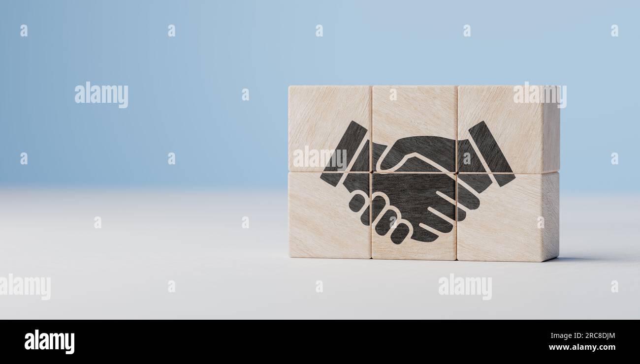 business contract. Handshake on wooden cube. business deal and ...