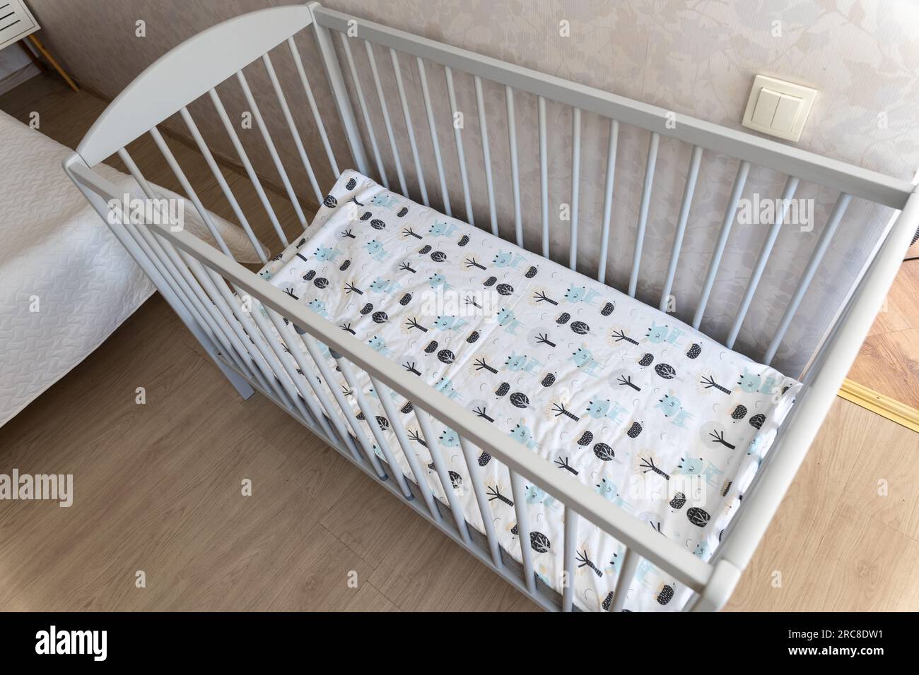 Empty crib hi-res stock photography and images - Alamy