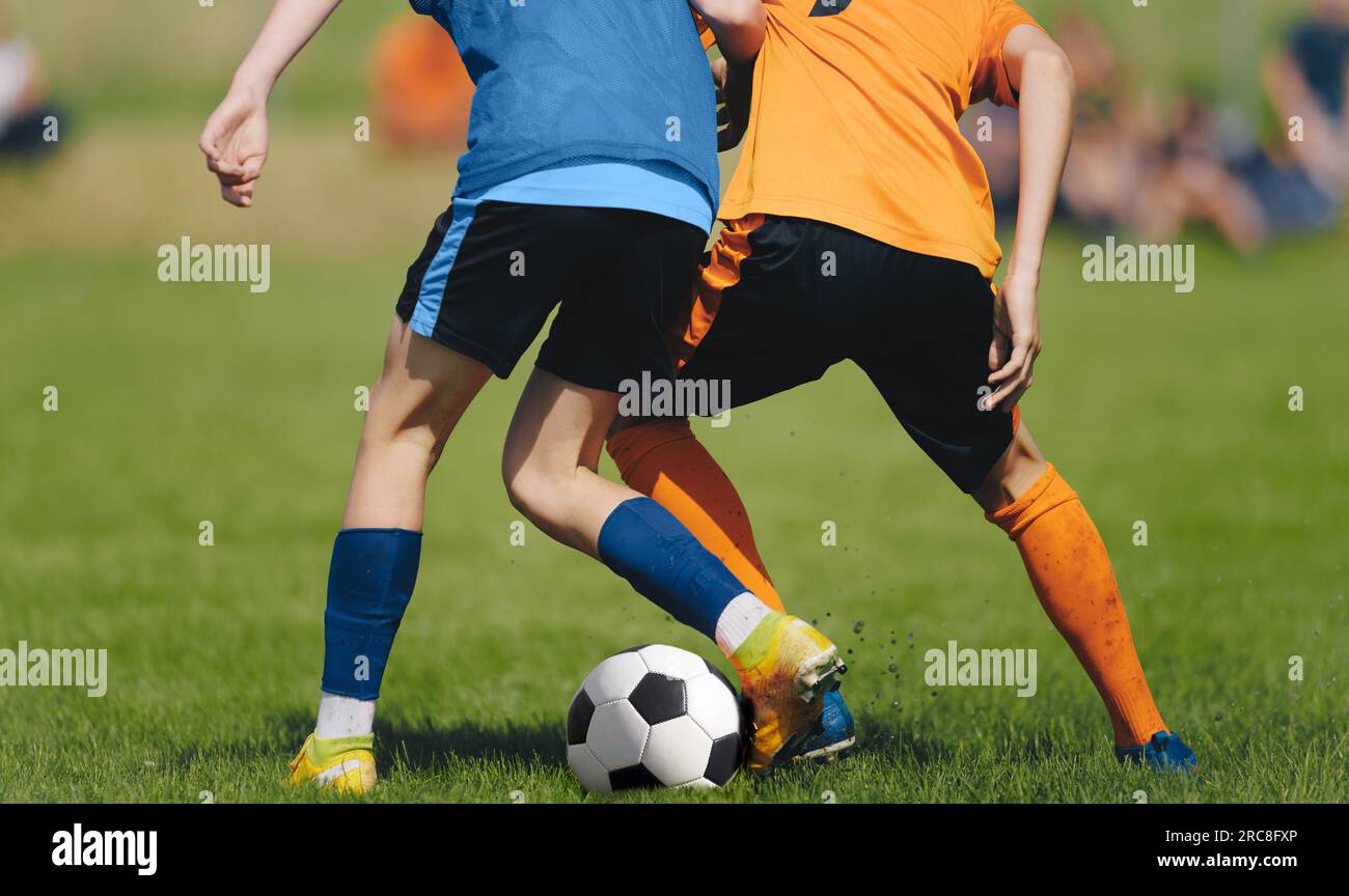 Anonymous Soccer Players Compete in a Duel on Sunny Day. Football Game ...