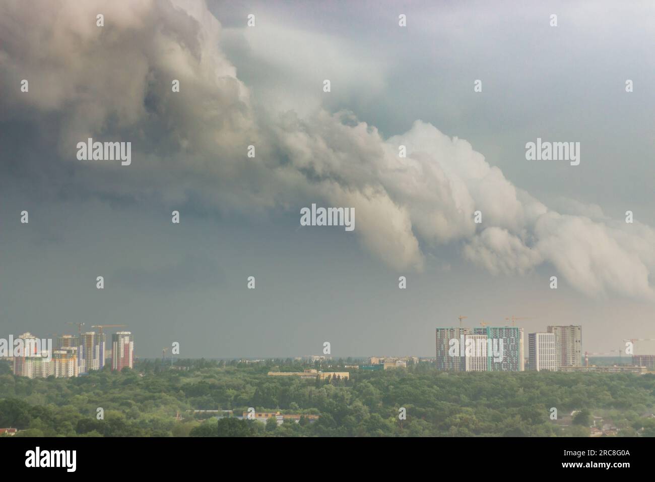 Heavy rain sky over city. Cloudy sky before storm. Cityscape before ...