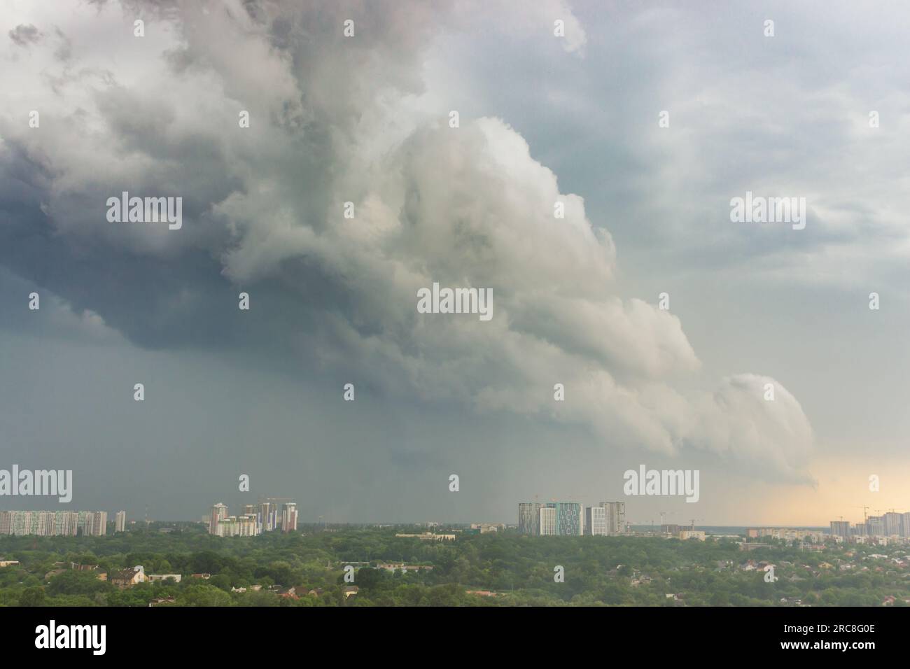 Heavy rain sky over city. Cloudy sky before storm. Cityscape before ...