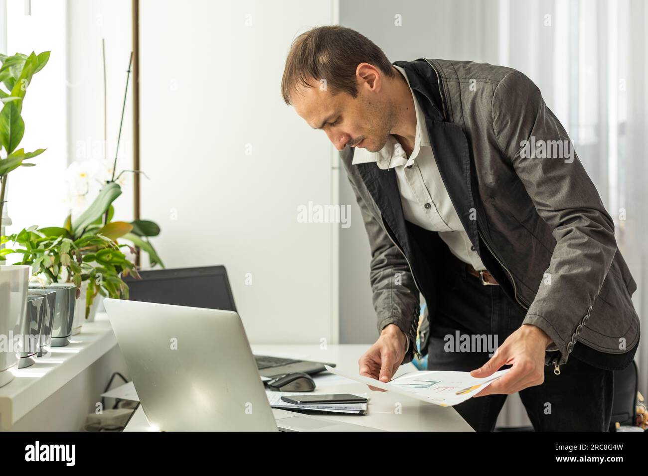 Busy concentrated confident caucasian bearded man, company ceo, top ...