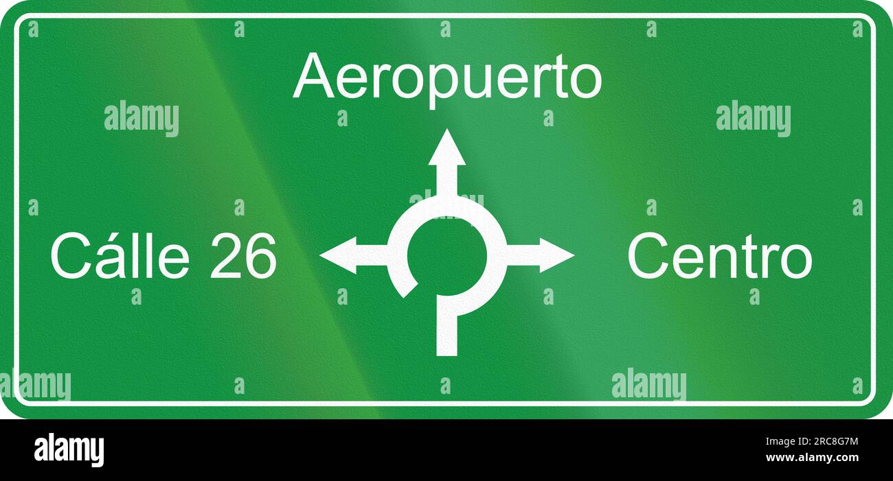 Directional sign at traffic circle in Colombia. Aeropuerto means ...