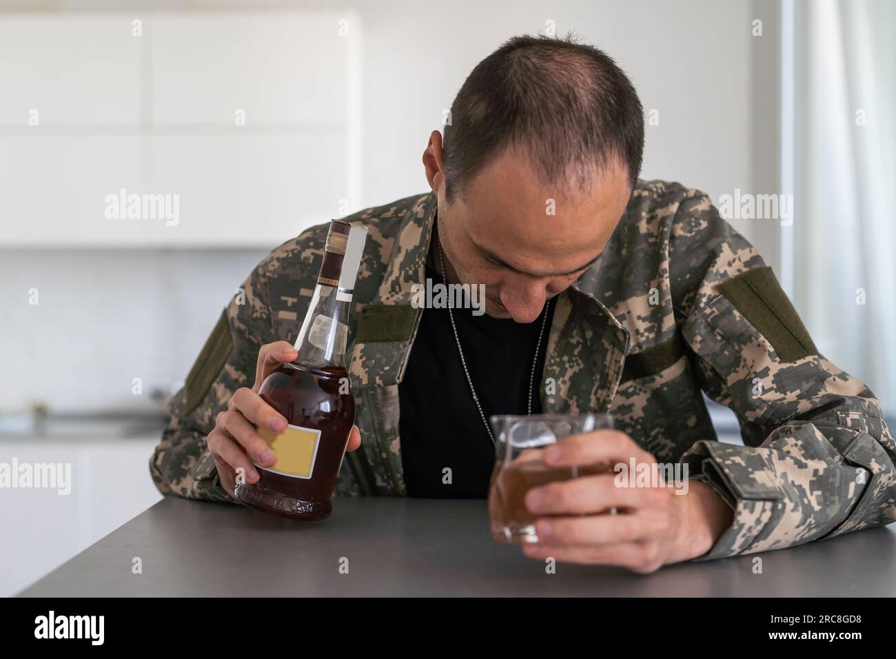 young attractive wasted and depressed addict and alcoholic man with ...